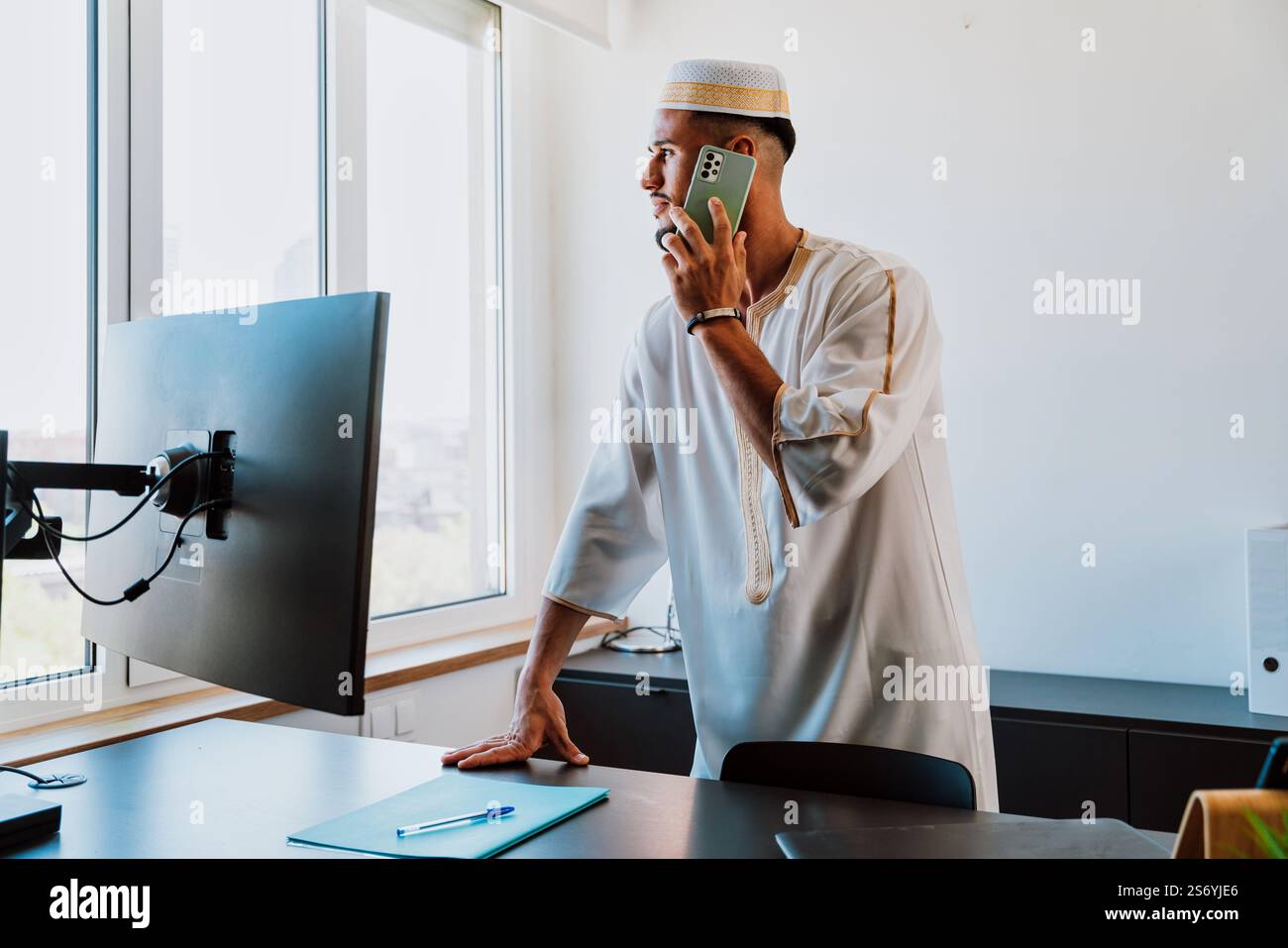 Moroccan Business man in the office. Young business man with ...
