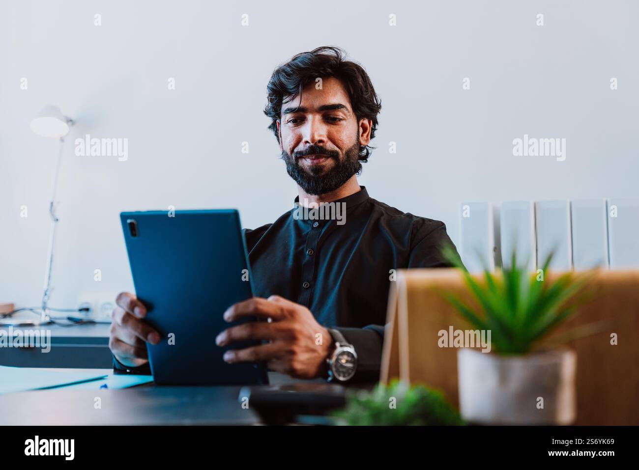 Pakistani Business man in the office. Young business man with ...