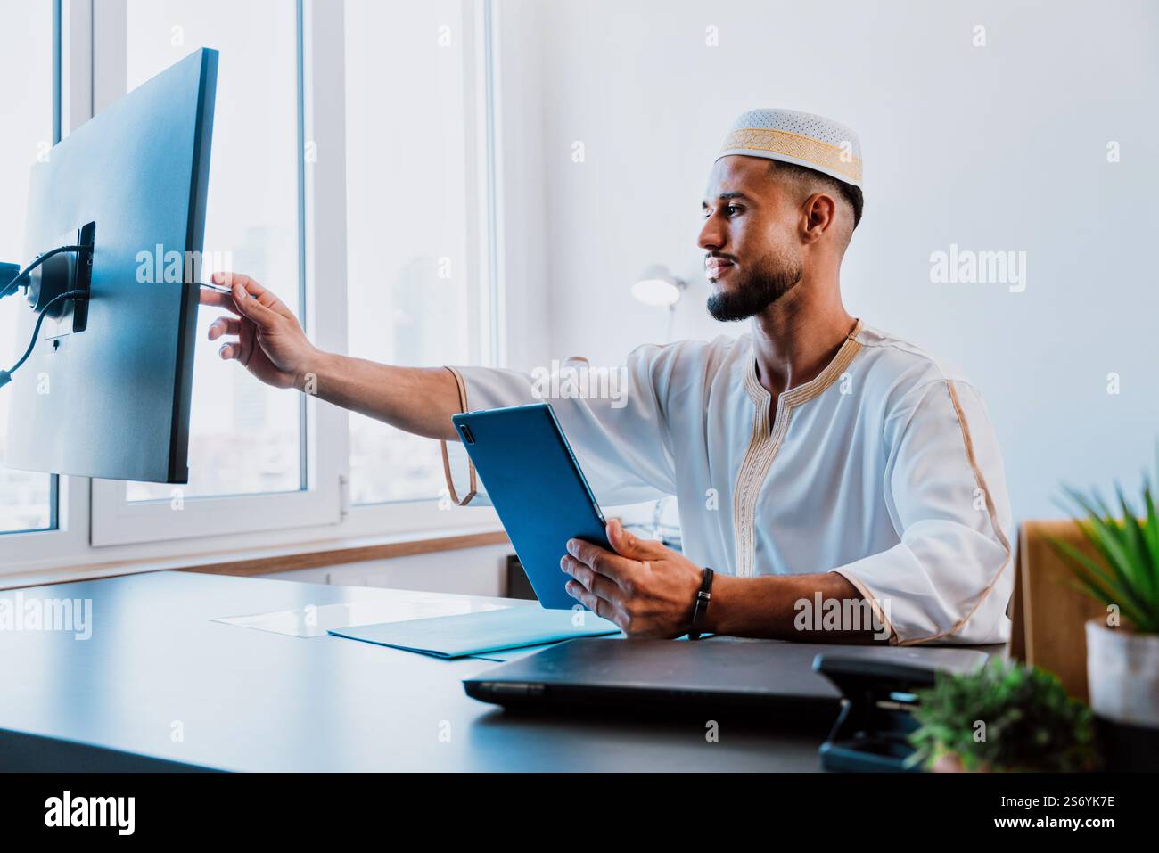 Moroccan Business man in the office. Young business man with ...