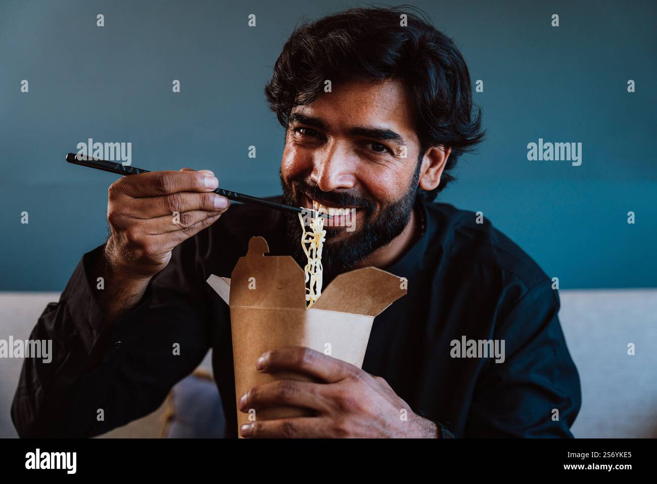 Pakistani guy with traditional outfit eating noodles Stock Photo - Alamy