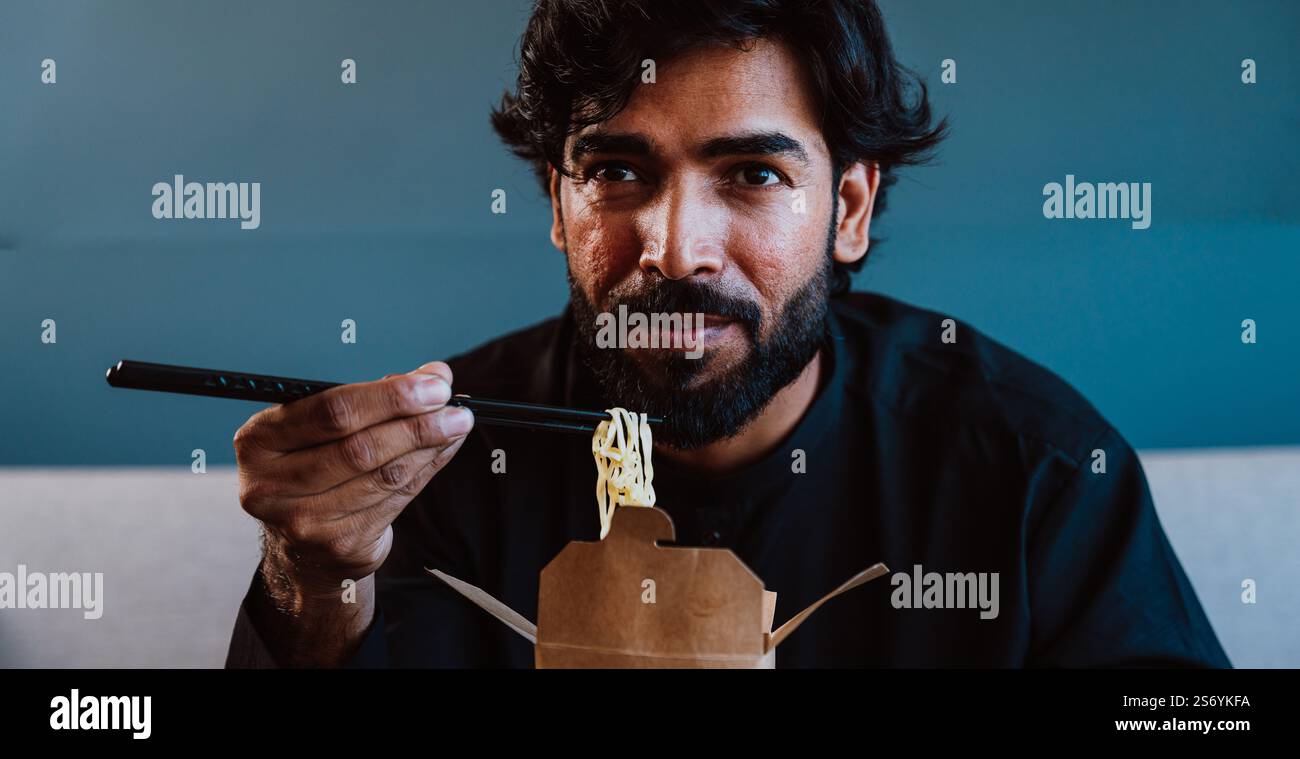 Pakistani guy with traditional outfit eating noodles Stock Photo - Alamy