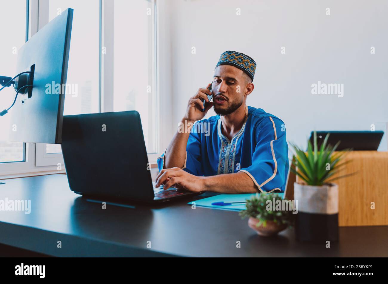 Moroccan Business man in the office. Young business man with ...
