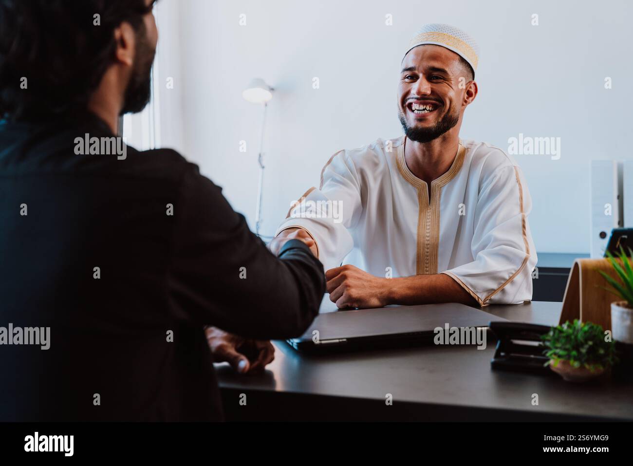 Moroccan Business man in the office. Young business man with ...