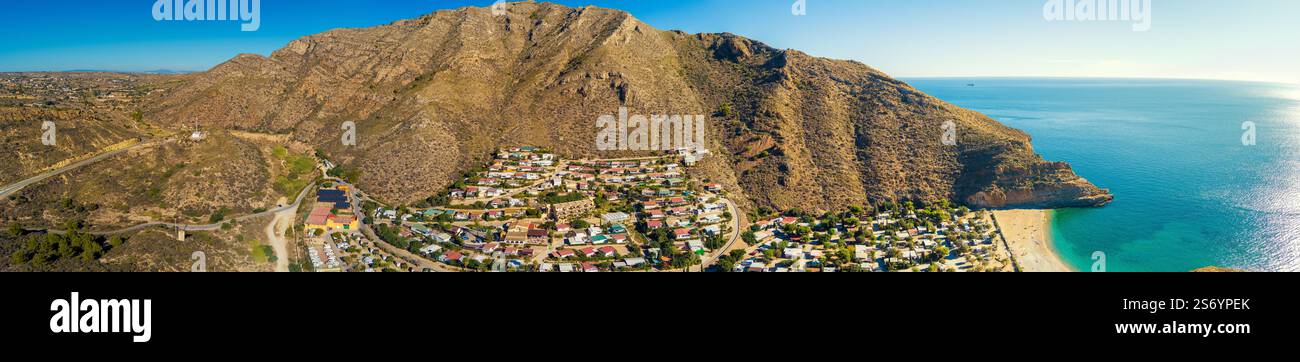 Mountain landscape with camping El Portus. Rocky seascape. Aerial ...