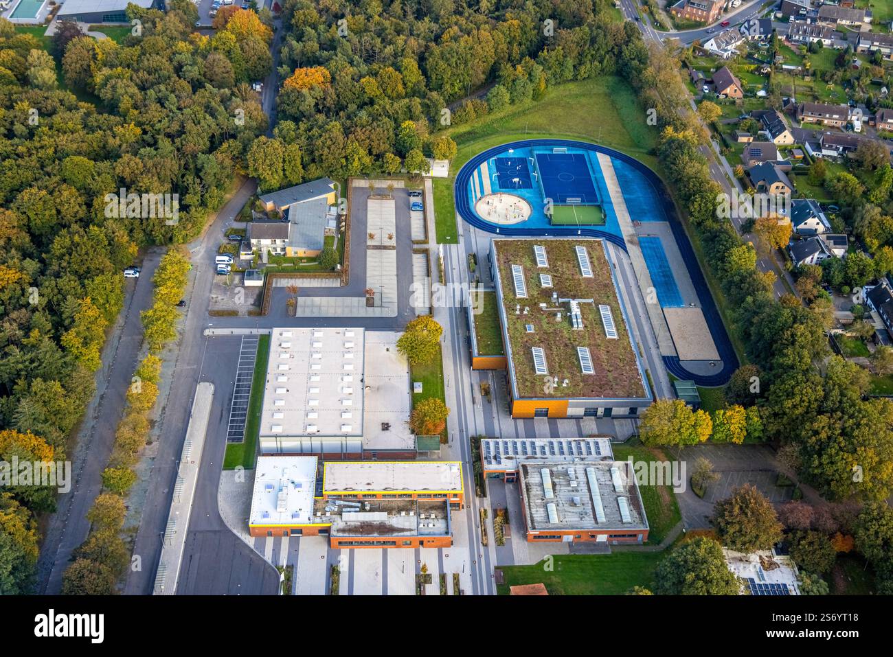 Aerial view, vocational college with sports field, basketball court and ...