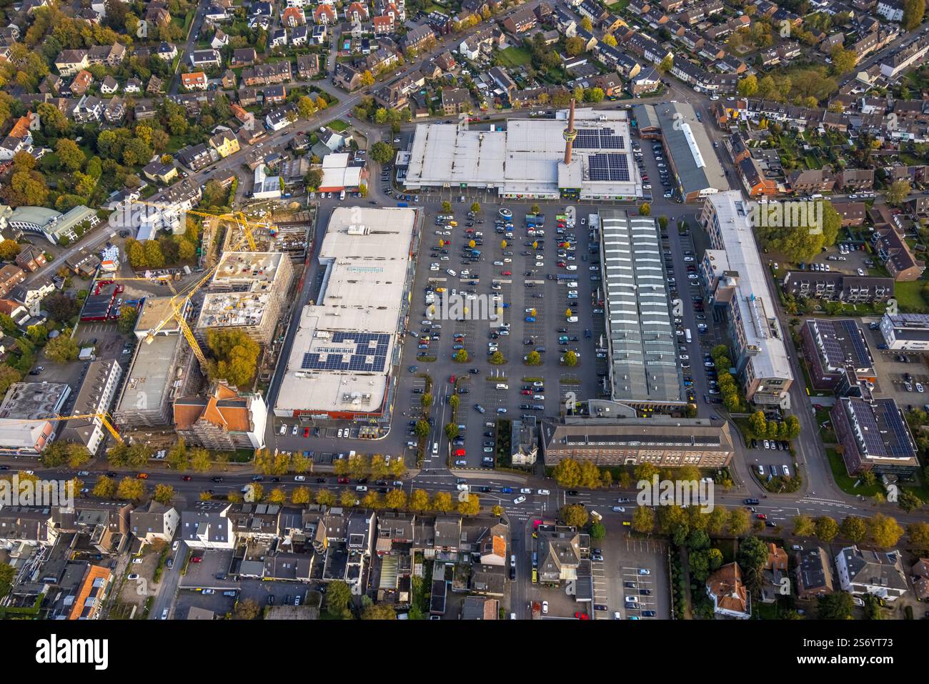 Aerial view, shopping center with supermarket, fashion stores, services ...