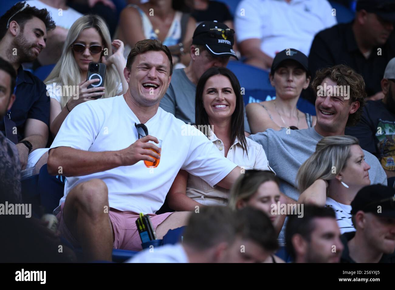 NRL Bulldogs player Liam Knight and his partner Channel Nine sports presenter Danika Mason watch ...
