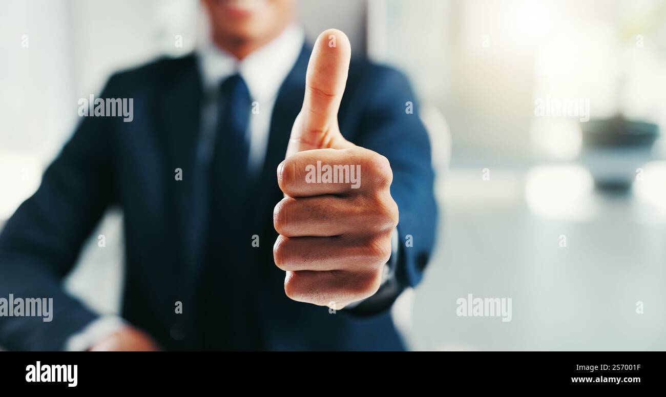 Businessman, hand and thumbs up in office, approval emoji and ...