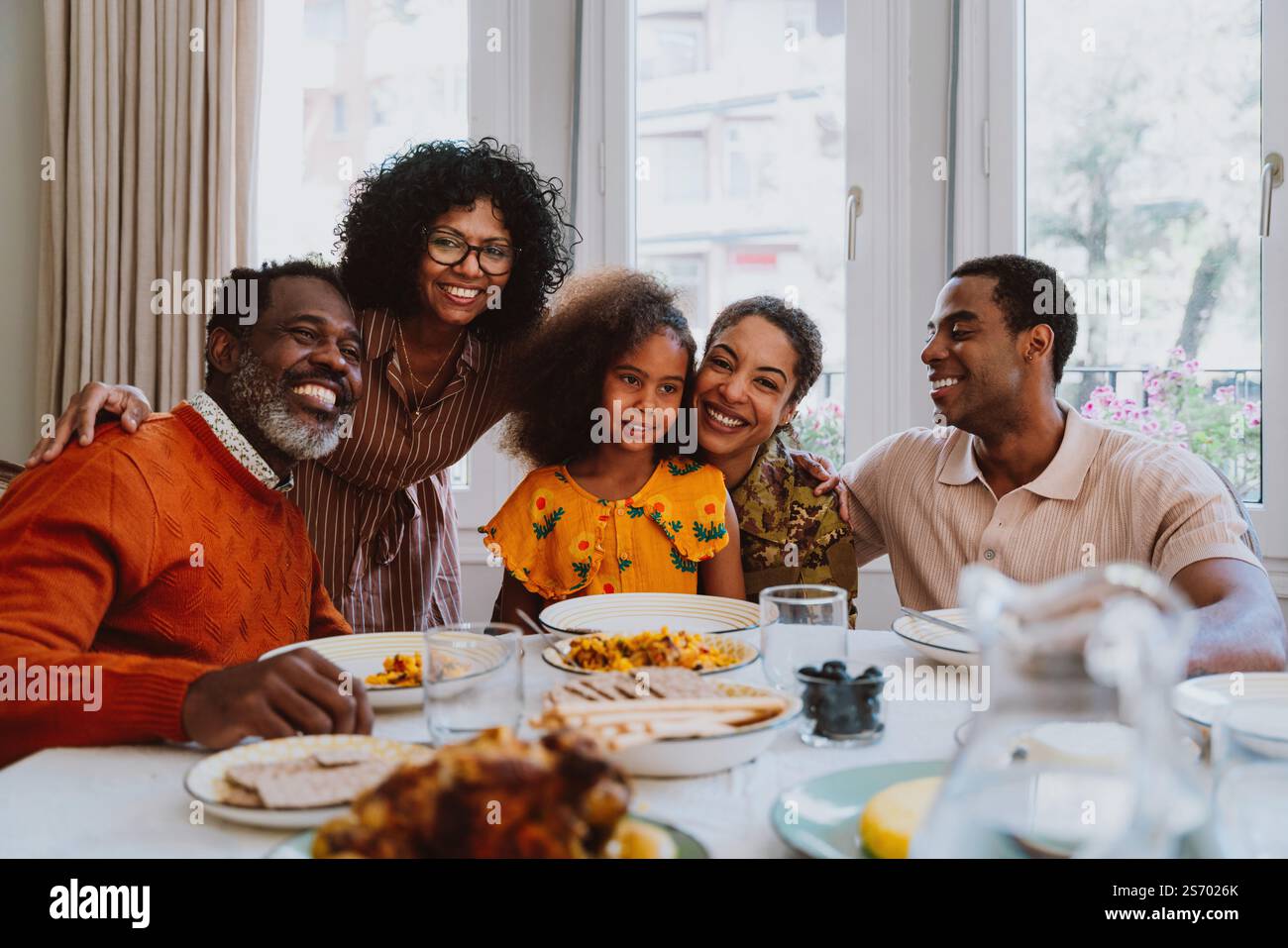 Us Veteran woman homecoming. Young woman coming back to her family from ...