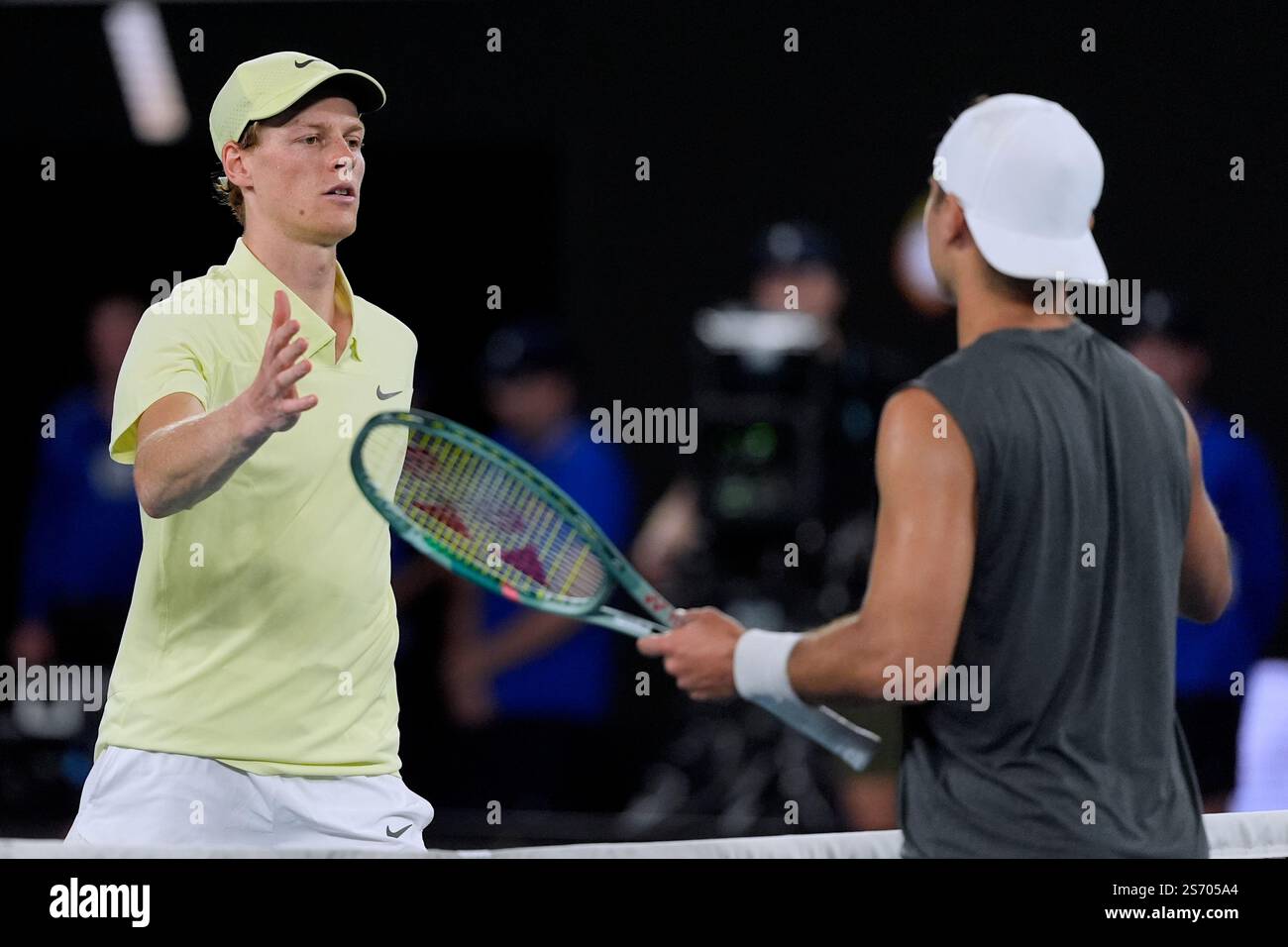 Jannik Sinner of Italy shakes hands with Marcos Giron of the U.S. following their third round ...