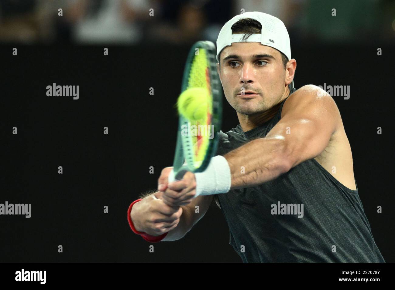 Melbourne, Australia. 18th Jan, 2025. Marcos Giron of USA returns ...