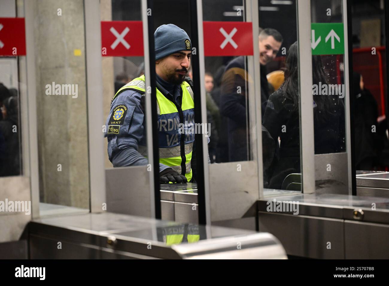 Stockholm, Uppland, Sweden. January 1 2025. Police and security guards ...