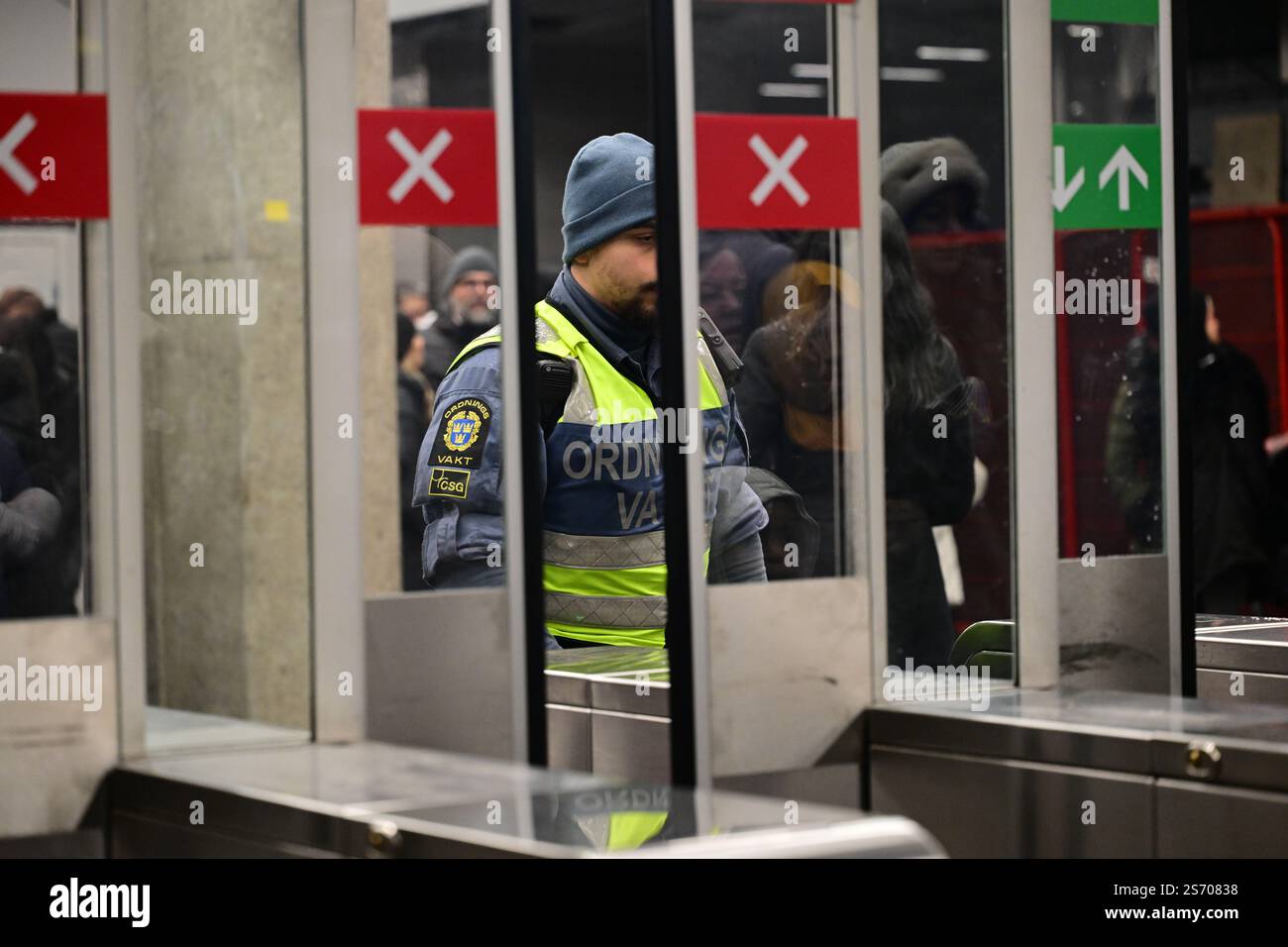 Stockholm, Uppland, Sweden. January 1 2025. Police and security guards ...