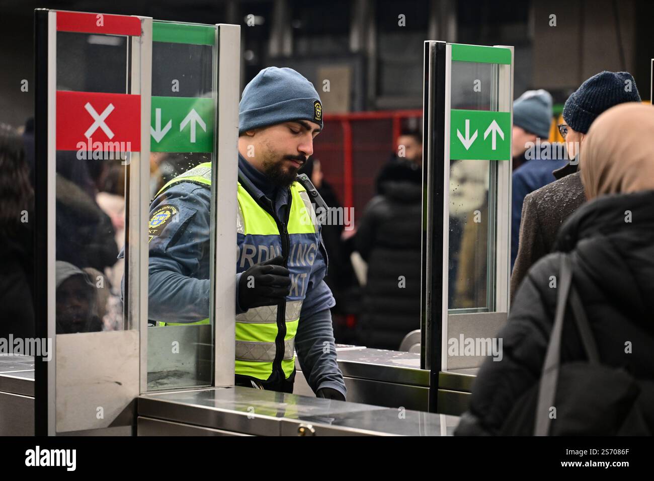 Stockholm, Uppland, Sweden. January 1 2025. Police and security guards ...