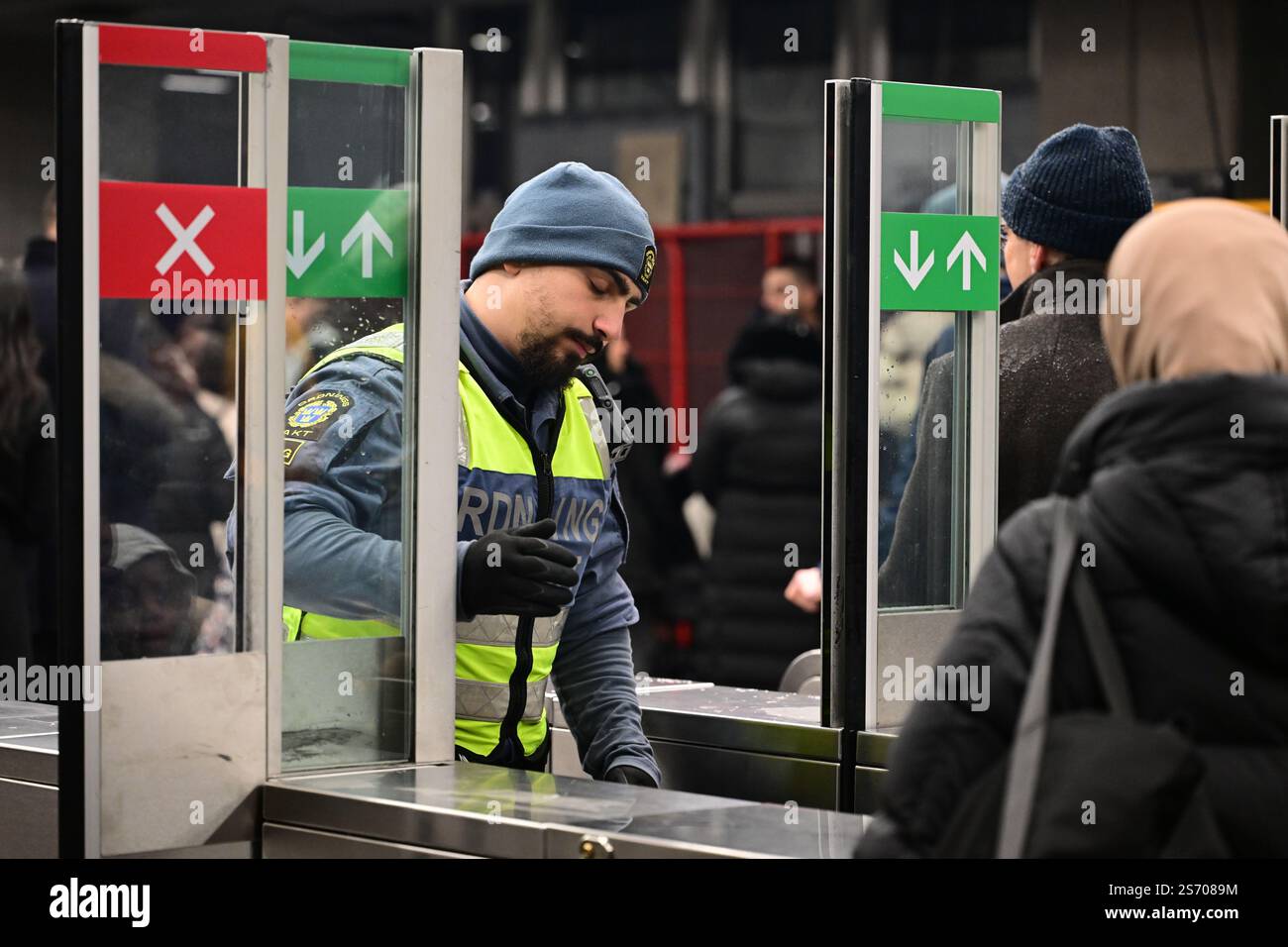 Stockholm, Uppland, Sweden. January 1 2025. Police and security guards ...
