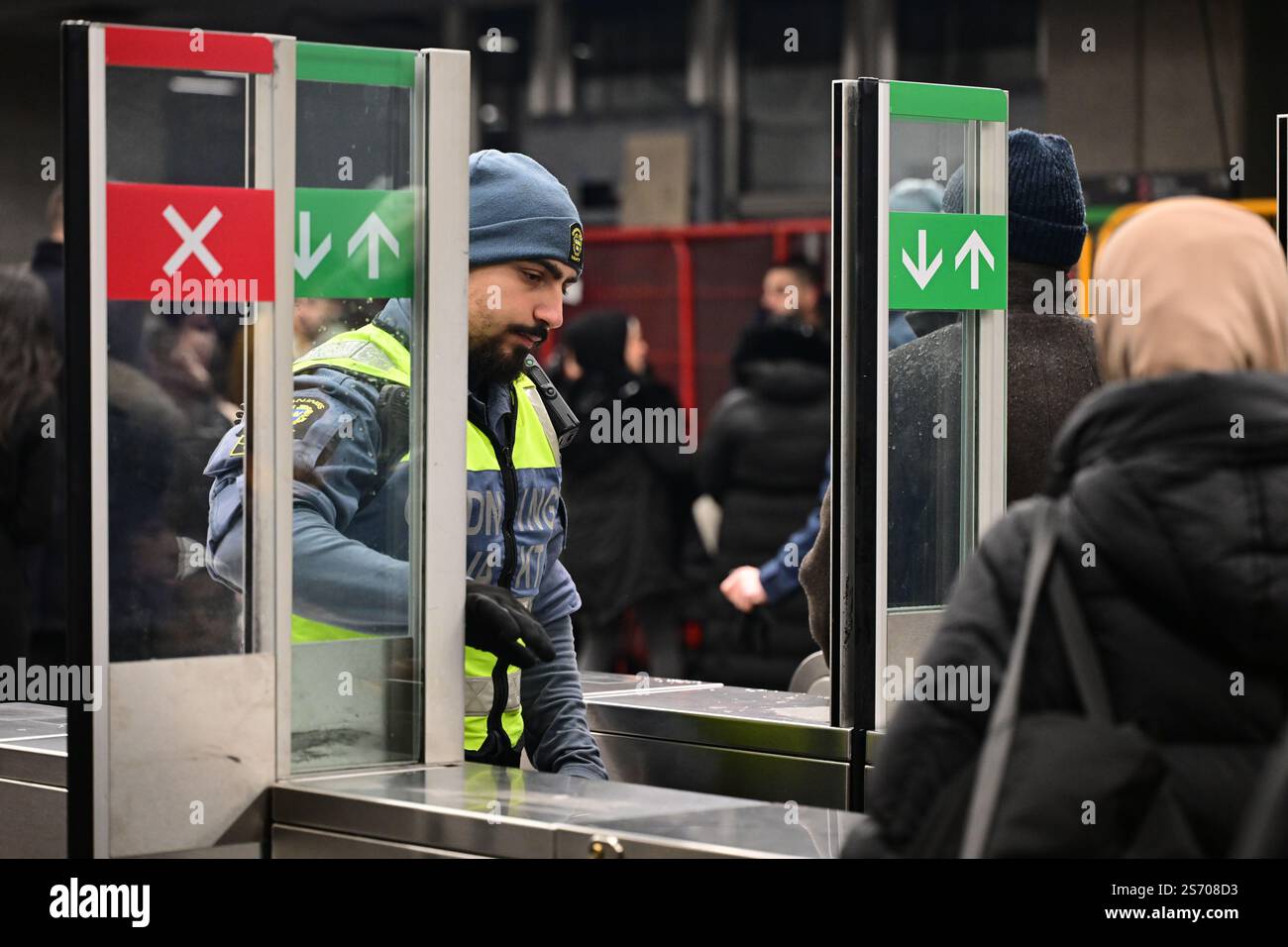 Stockholm, Uppland, Sweden. January 1 2025. Police and security guards ...