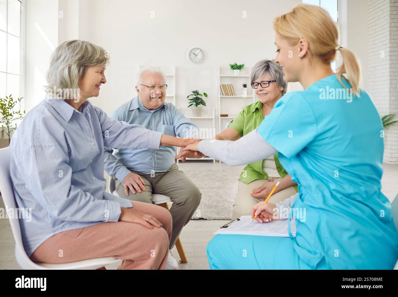 Senior people small group activities for nursing home residents, caring ...