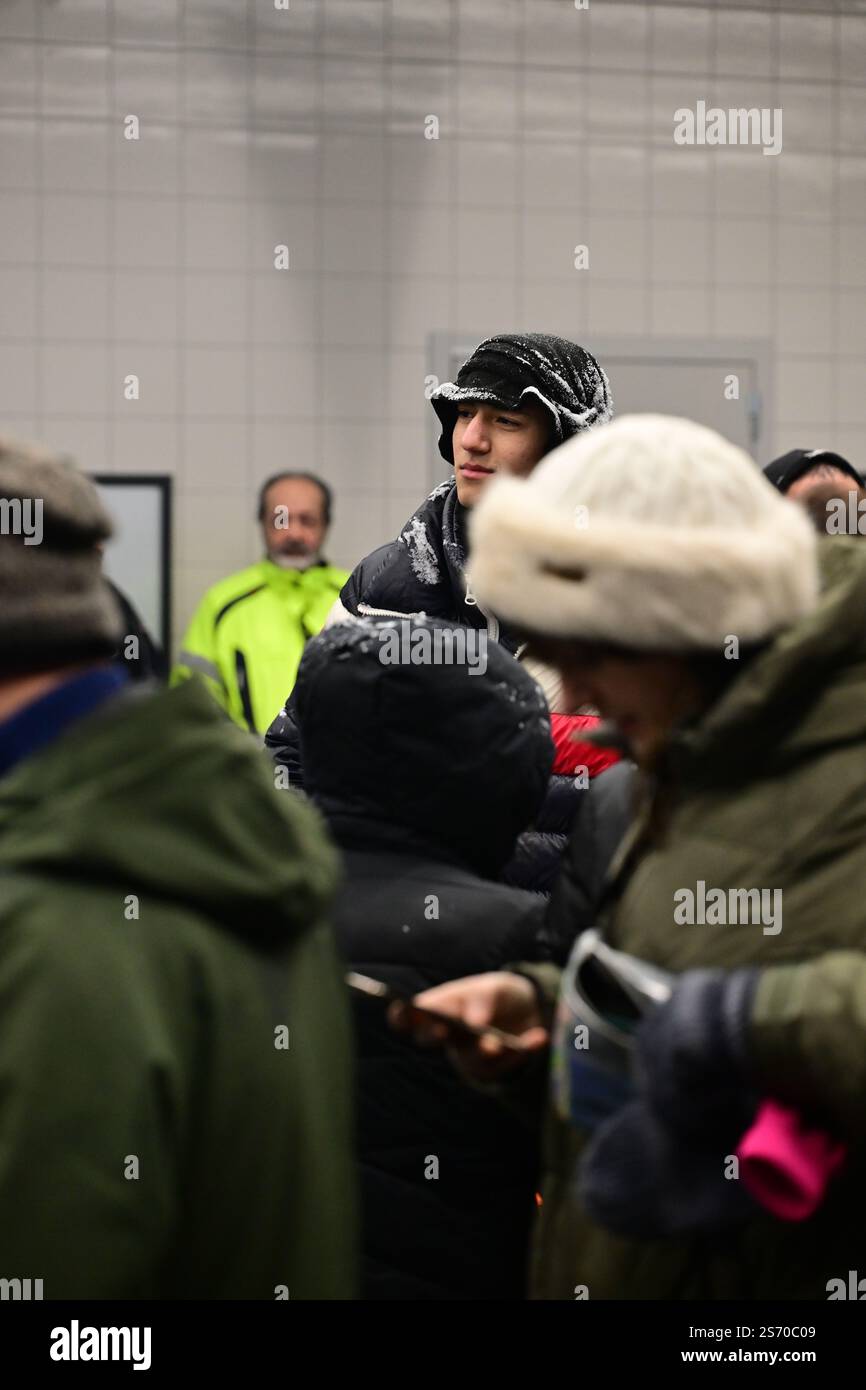 Stockholm, Uppland, Sweden. January 1 2025. People in a crowded subway ...