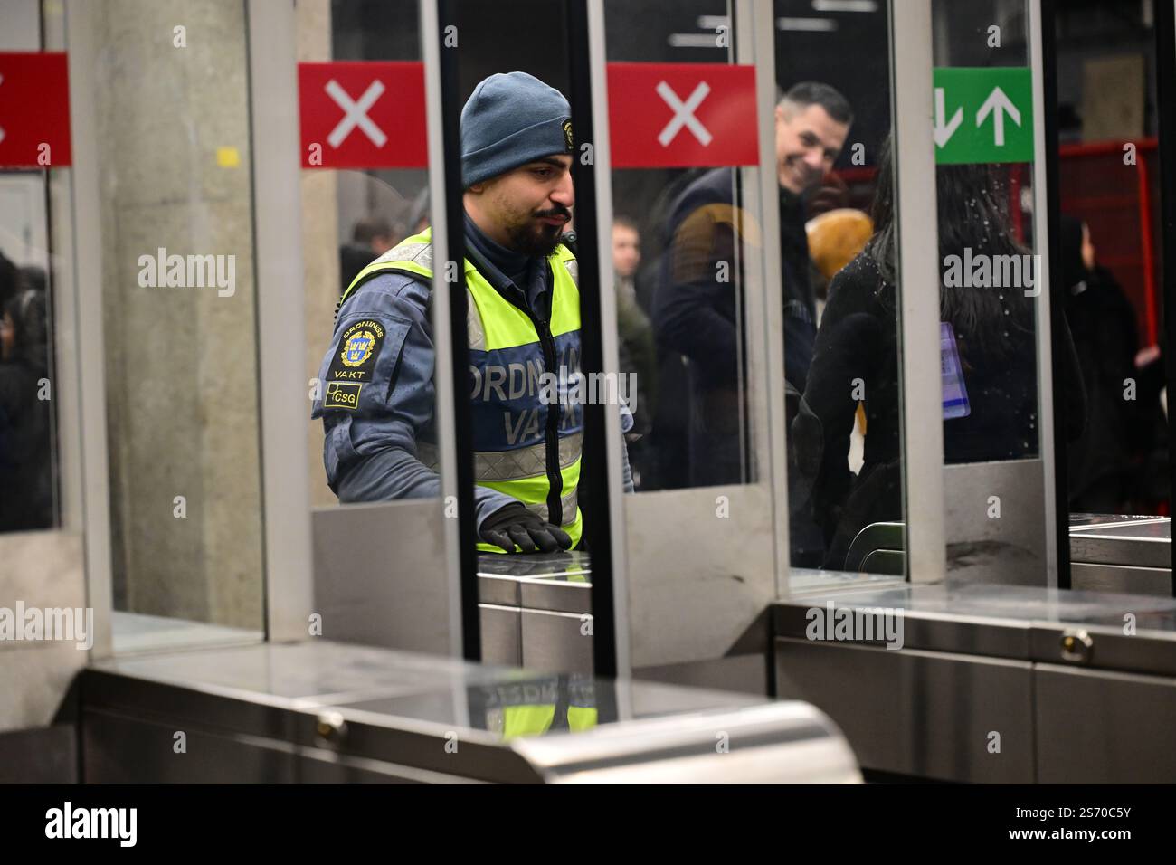 Stockholm, Uppland, Sweden. January 1 2025. Police and security guards ...