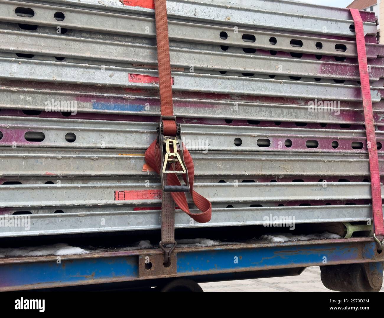 Securing the load on the truck with a tension strap Stock Photo - Alamy