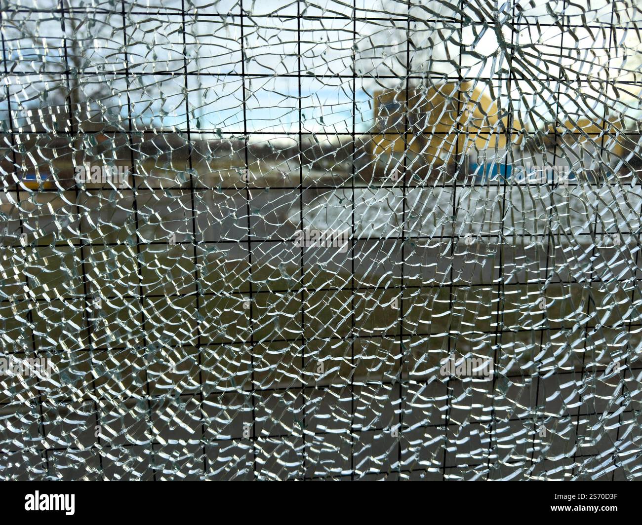 Cracks in the glass on the window after a break-in Stock Photo - Alamy
