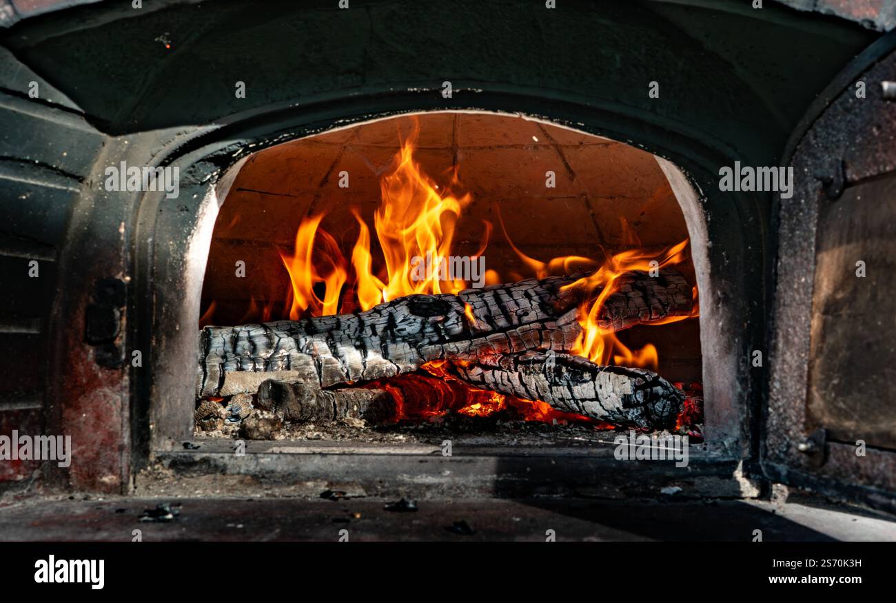Fire inside a stone oven Stock Photo - Alamy