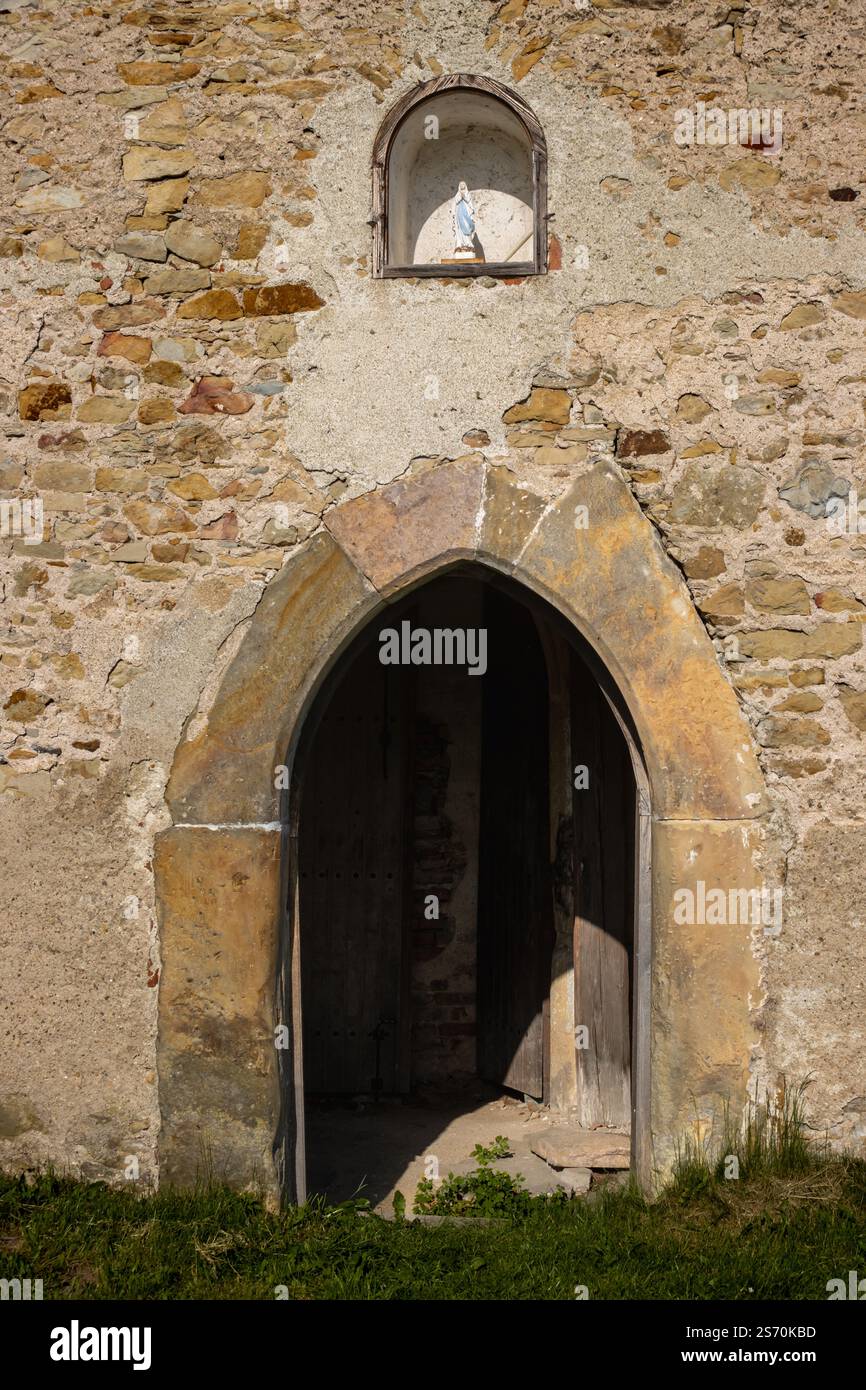 Stone wall of the ruin of Monastery of Crown of Virgin Mary. Entrance ...