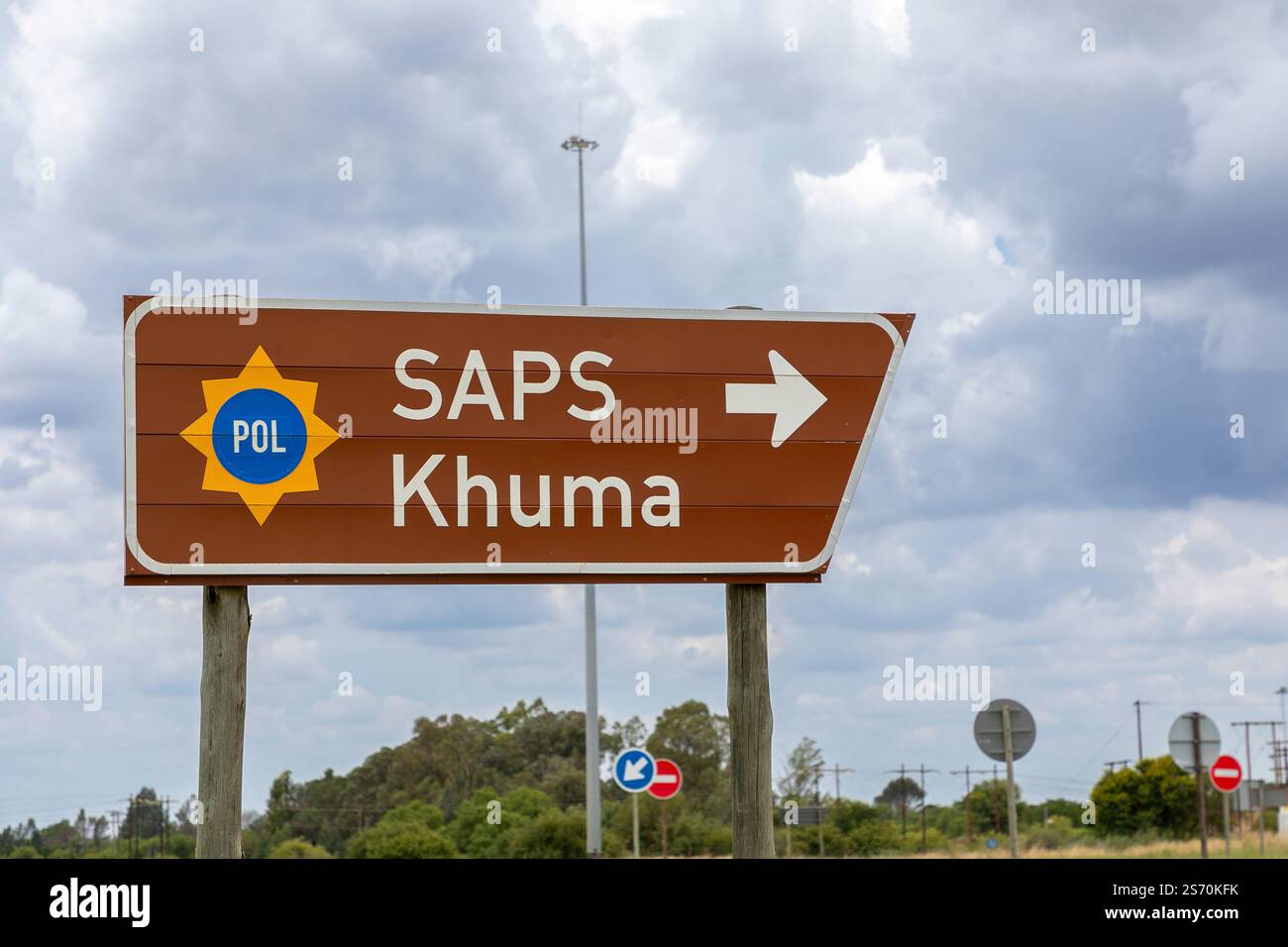Close up on Road sign reading SAPS Khuma. Khuma Police station is close ...