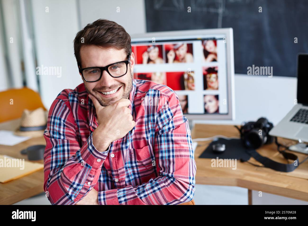 Man, photographer and portrait by computer screen for editing picture ...