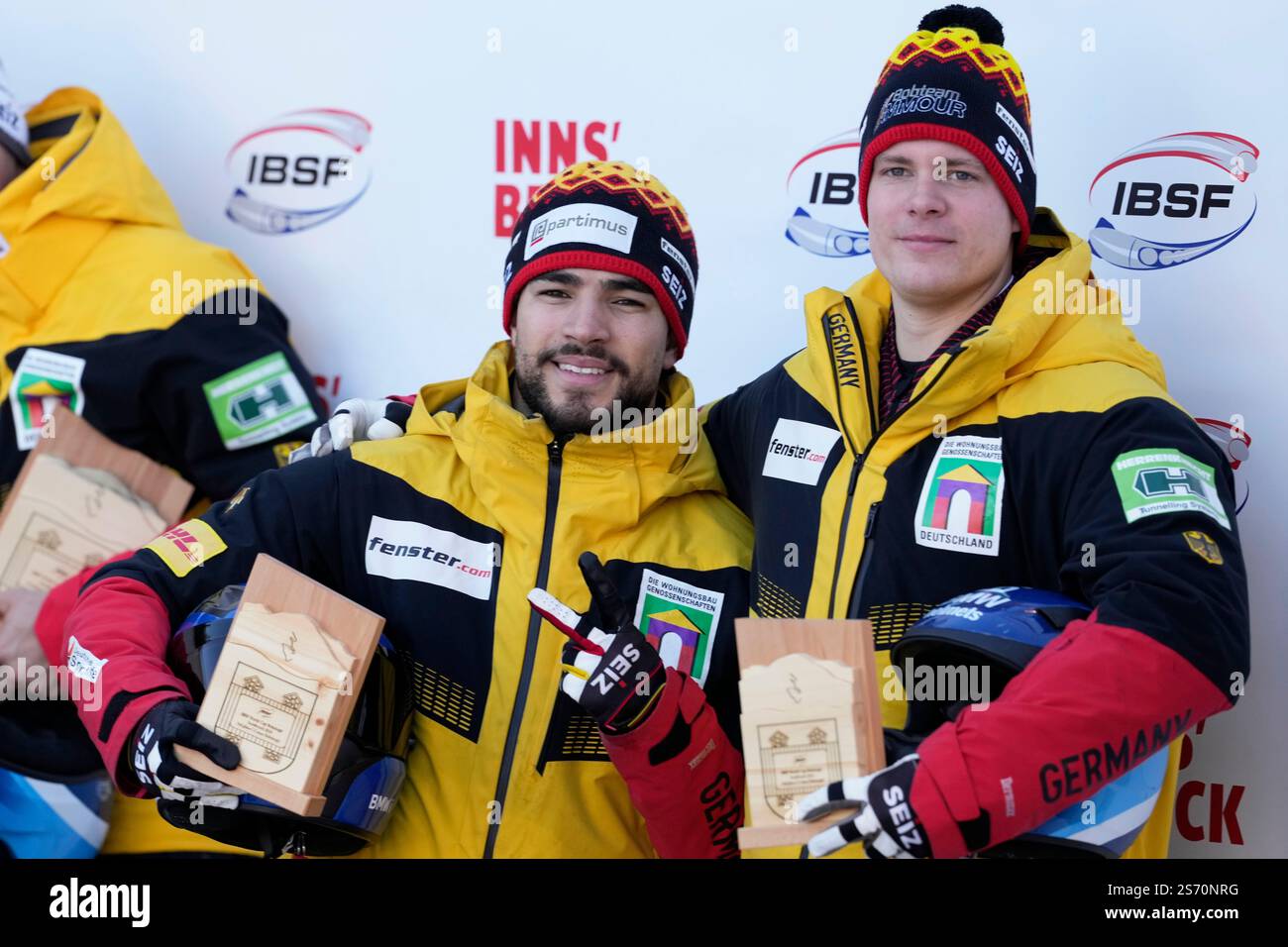 Adam Ammour and Nick Stadelmann, of Germany, pose on the podium after ...