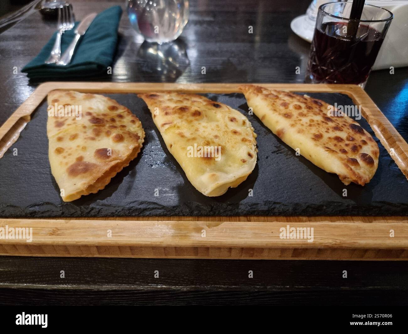 Tatar food: kystyby, flatbread wraps filled with mashed potato Stock ...
