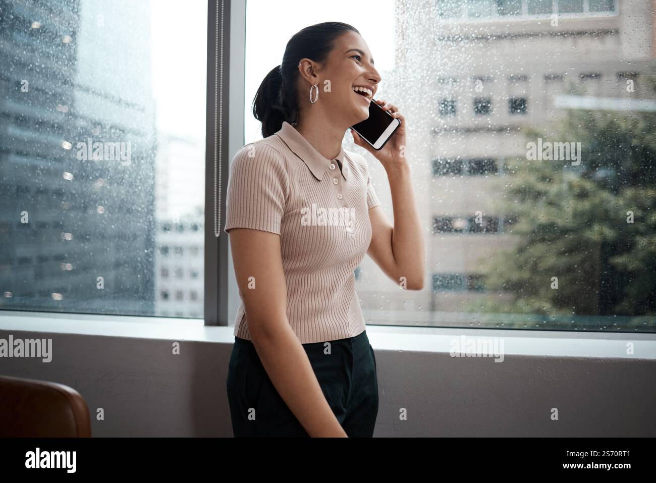Woman, phone call and funny conversation in office, journalist laughing ...
