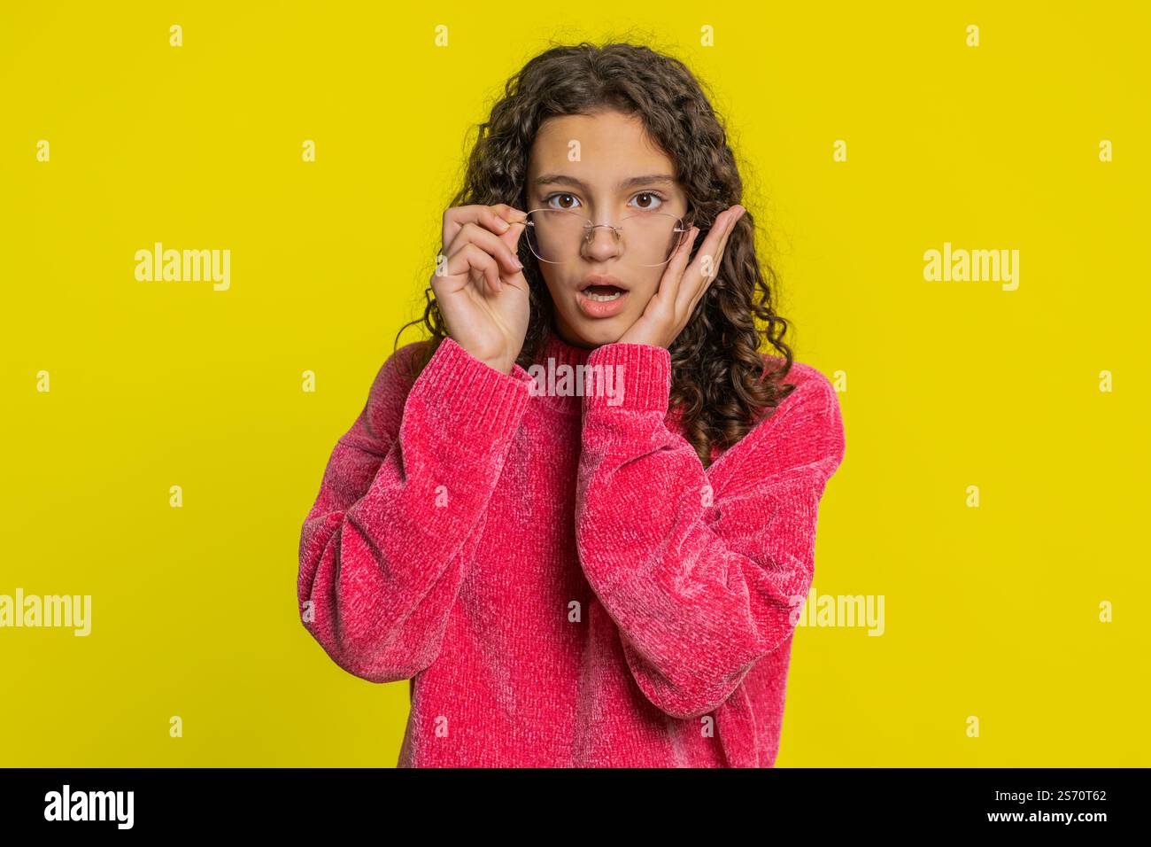 Oh my God, Wow. Excited amazed girl taking off eyeglasses in surprise ...