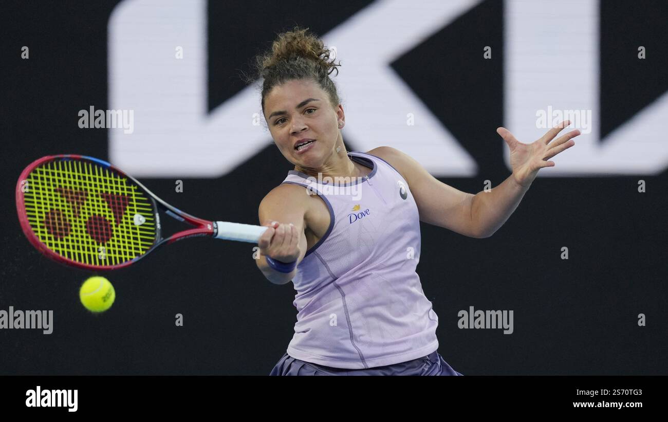 Jasmine Paolini of Italy returns a shot to Elina Svitolina of Ukraine ...