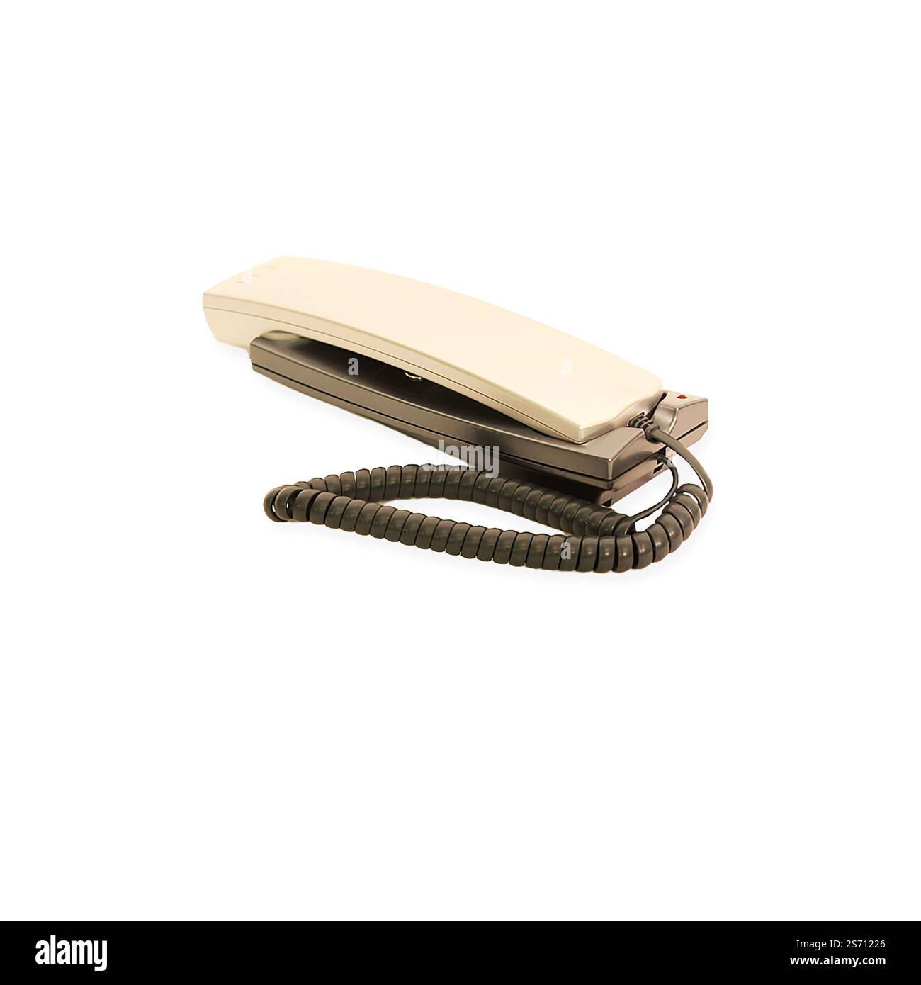 A Classic Wallmounted Telephone featuring a Coiled Cord combines ...