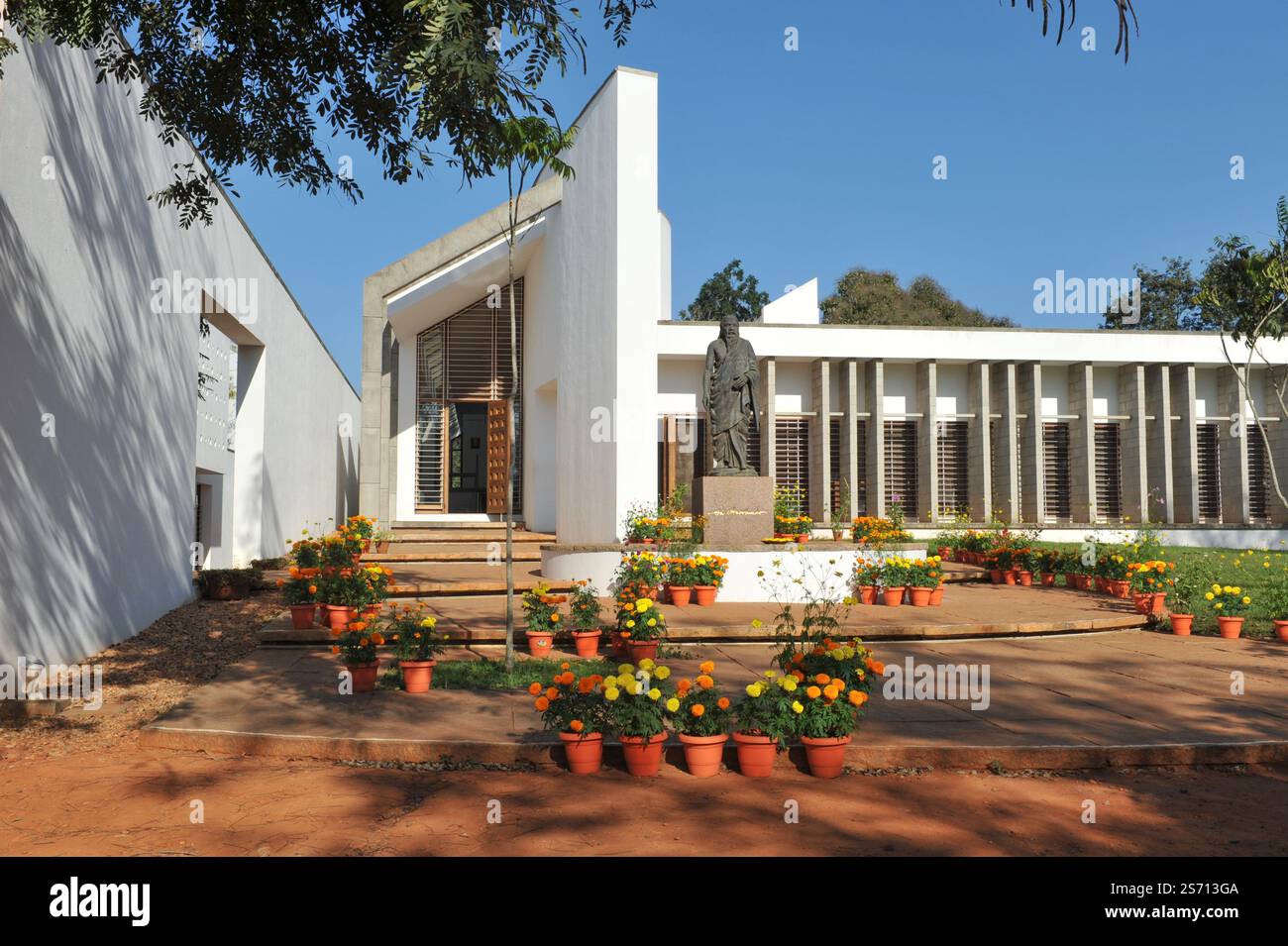AUROVILLE, INDIA - The Sri Aurobindo statue in front of Savitri Bhavan ...