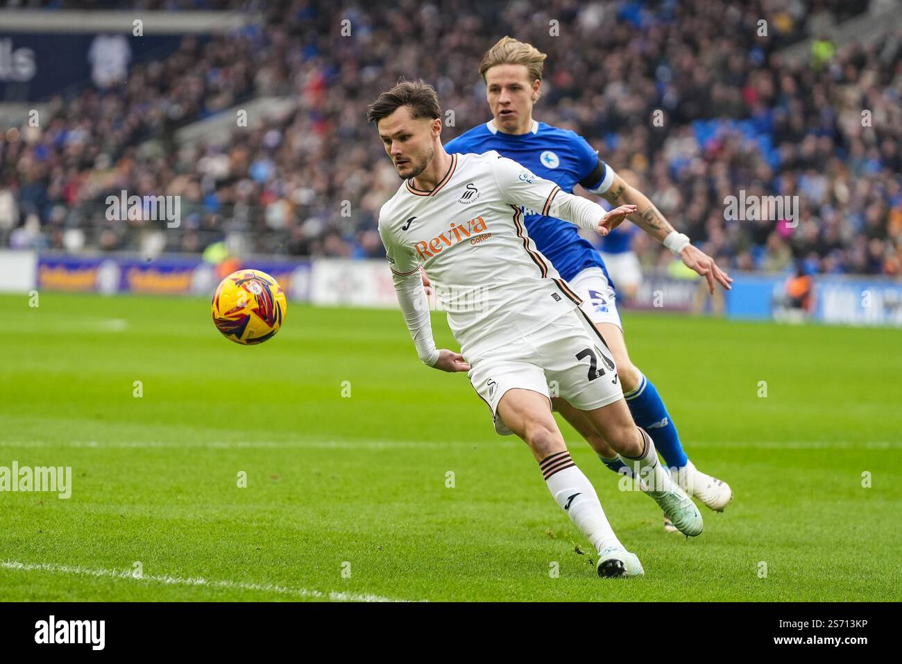Cardiff, UK. 18th Jan, 2025. Liam Cullen of Swansea City under pressure ...