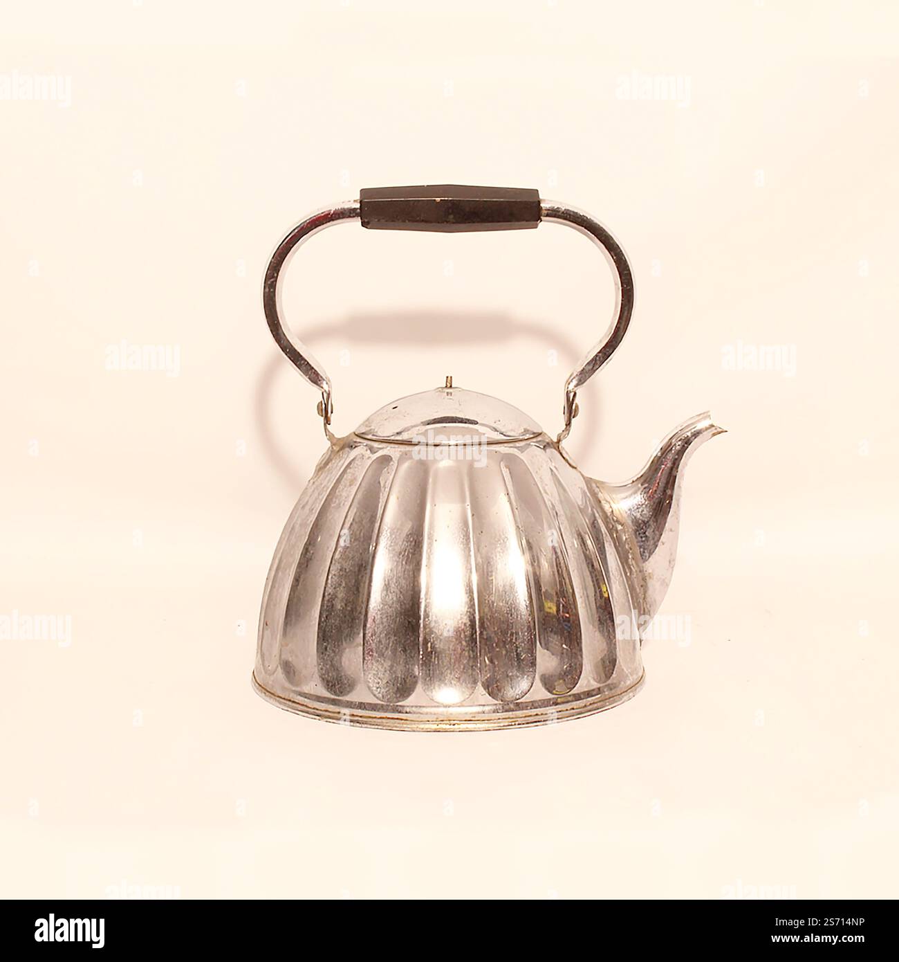 An Elegant Vintage Aluminum Teapot Featuring a Beautifully Curved ...