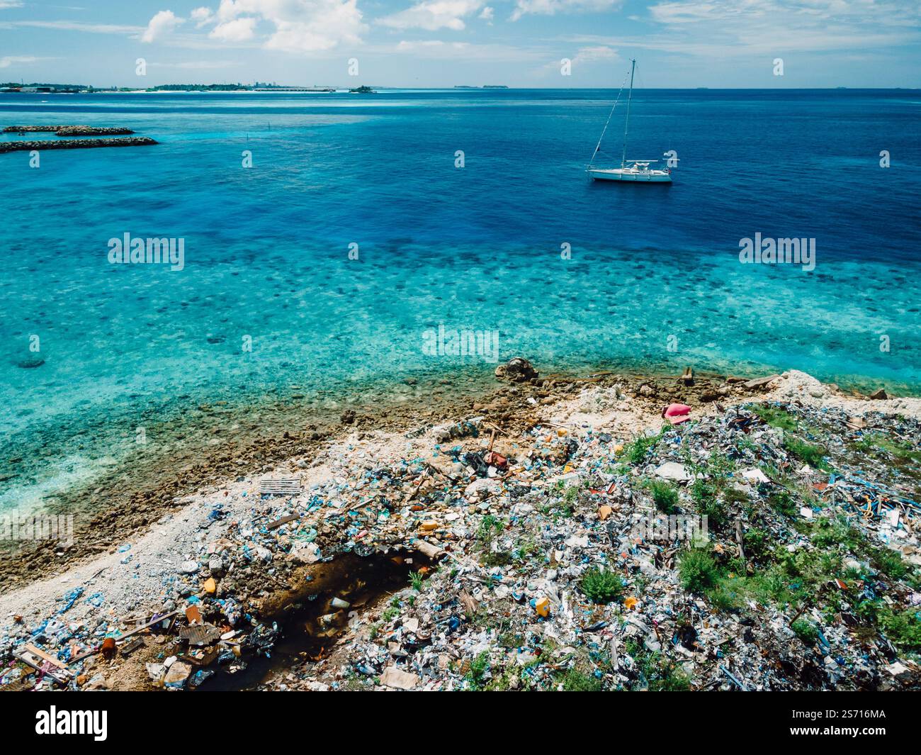 Rubbish pollution dump on island in Maldives. Drone view Stock Photo ...