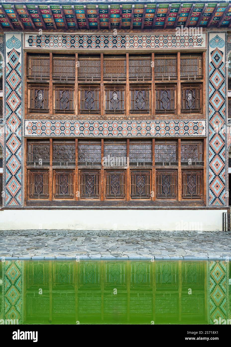 The intricately designed Shaki Khan Palace, featuring a tranquil ...