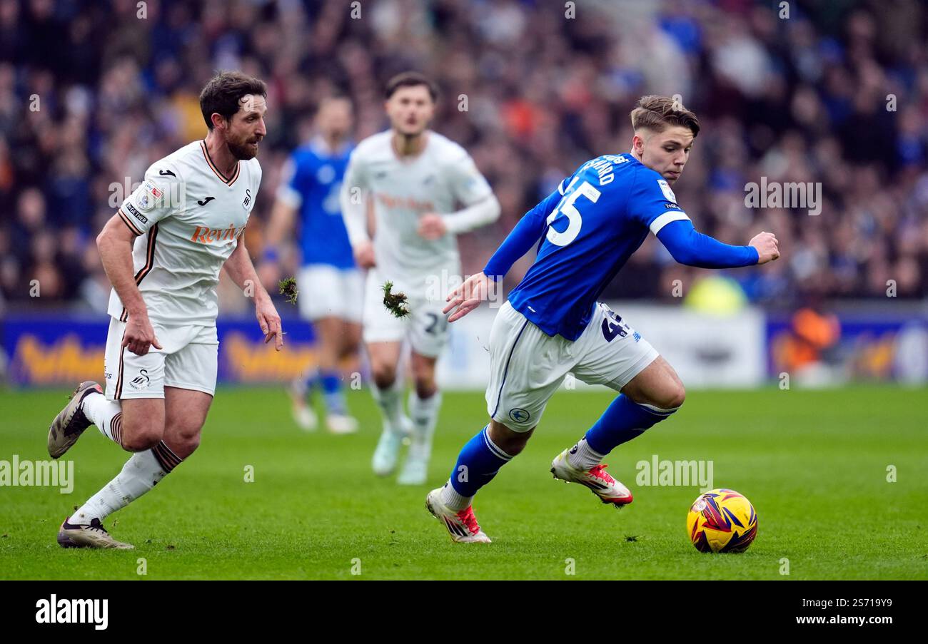 Swansea City's Joe Allen and Cardiff City's Cian Ashford (right) battle ...