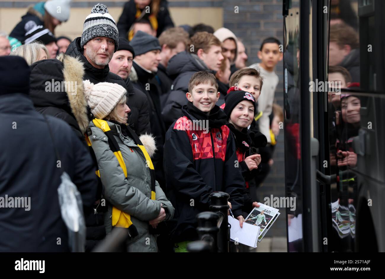 Fans wait for the players to arrive outside the ground ahead of the Sky ...