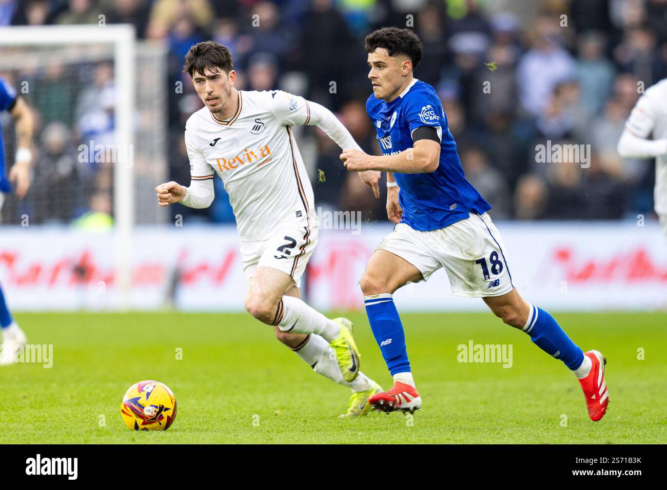 Cardiff, UK. 18th Jan, 2025. Alex Robertson of Cardiff City (R) in ...