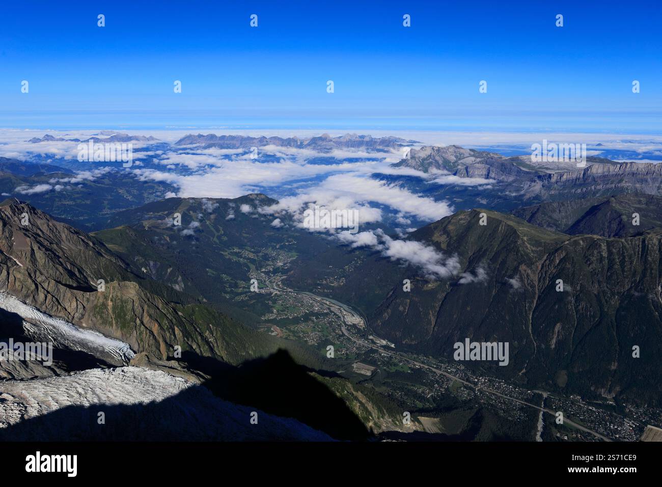 High view of the Chamonix valley from the Aiguille de midi cable car ...