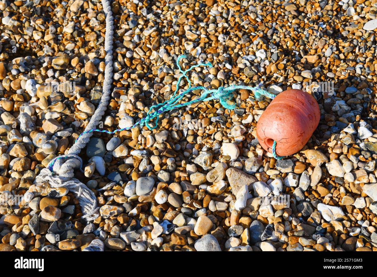 Float and ropes on the beach Stock Photo - Alamy