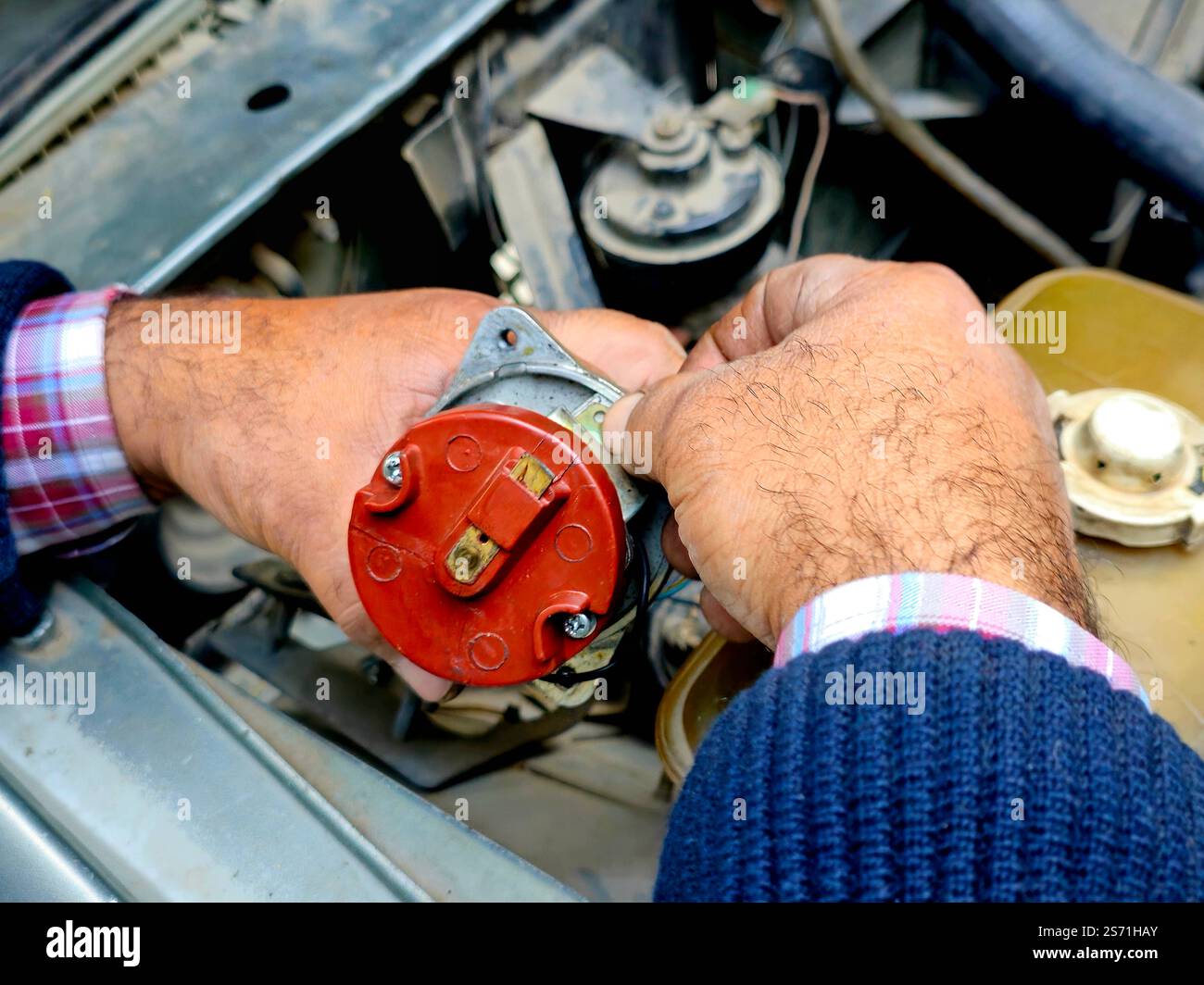 maintenance and service of car distributor, an electric and mechanical ...