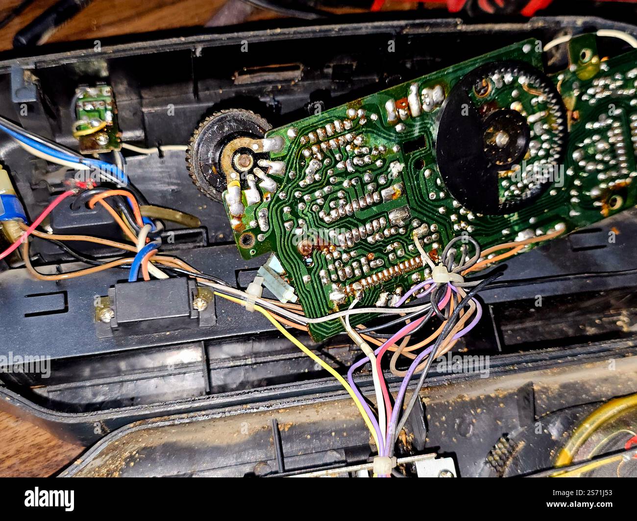 Cairo, Egypt, December 25 2024: An old radio cassette player maintenance, using standard old ...