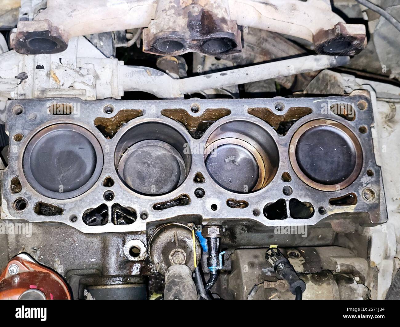 maintenance of automotive internal combustion engine, replacement of ...
