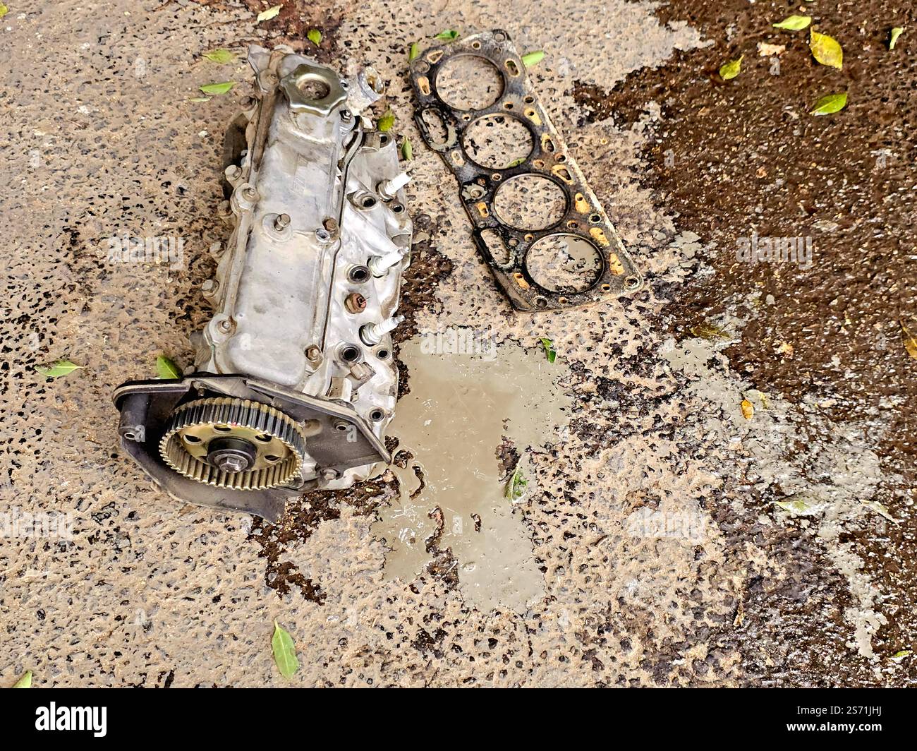 broken cylinder head gasket of the vehicle, with the Tahini like liquid ...