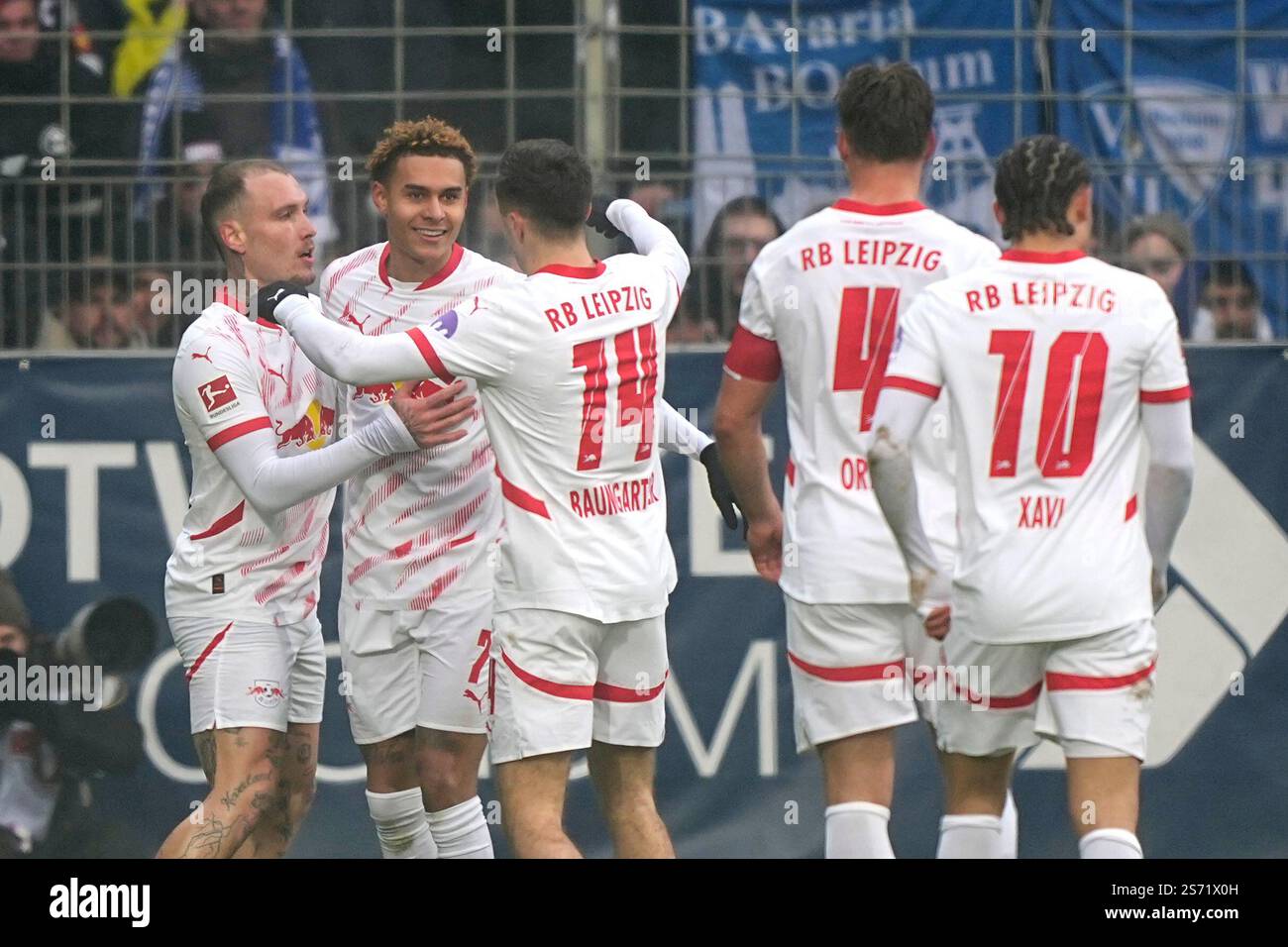 Leipzig's Antonio Nusa, second left, celebrates after scoring his side ...